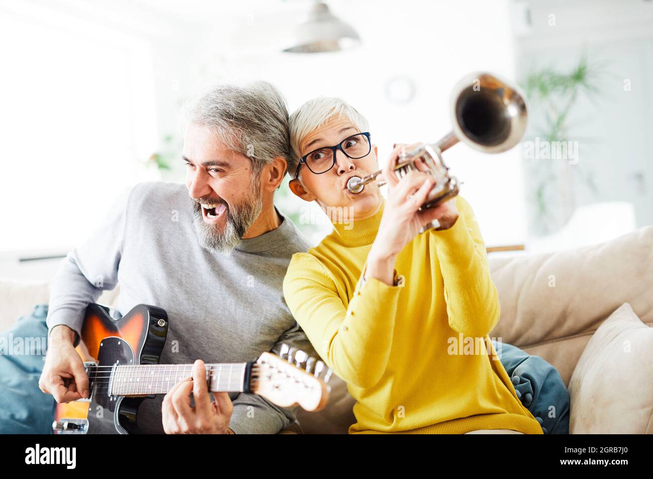 Women dancing playing musical instruments hi-res stock photography and ...