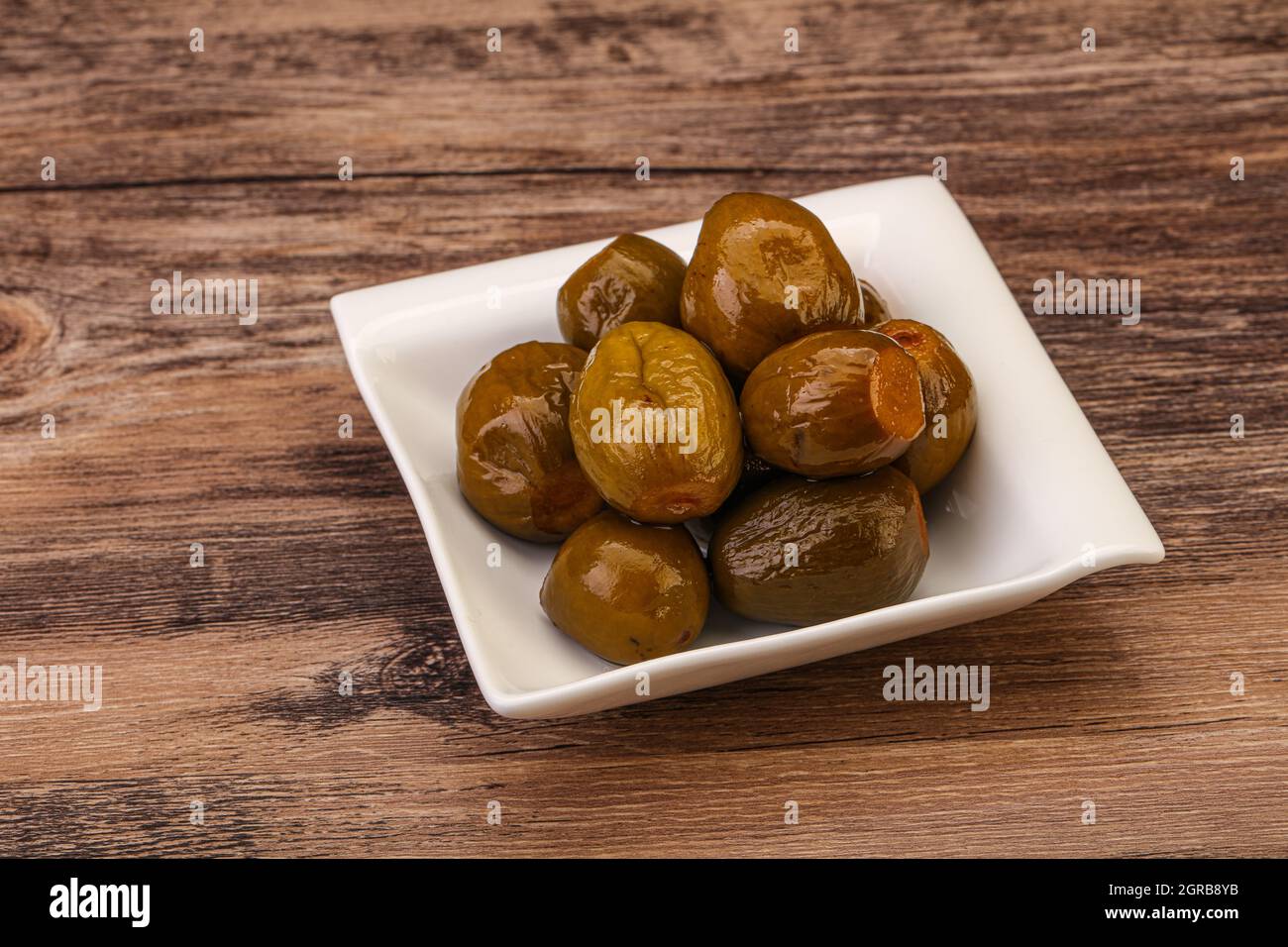Marinated feijoa fruit in the bowl Stock Photo - Alamy