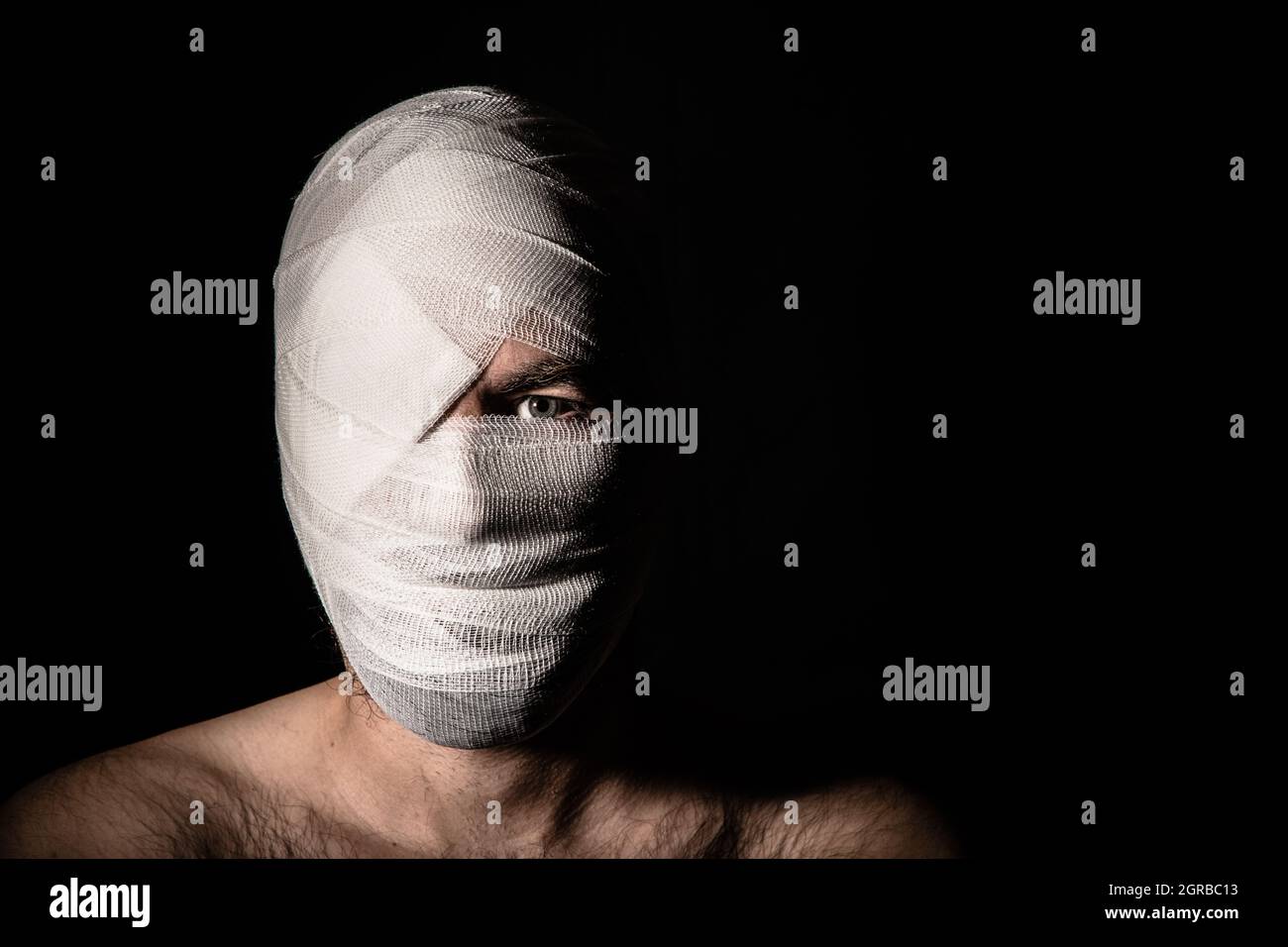 Man bandages face hi-res stock photography and images - Alamy