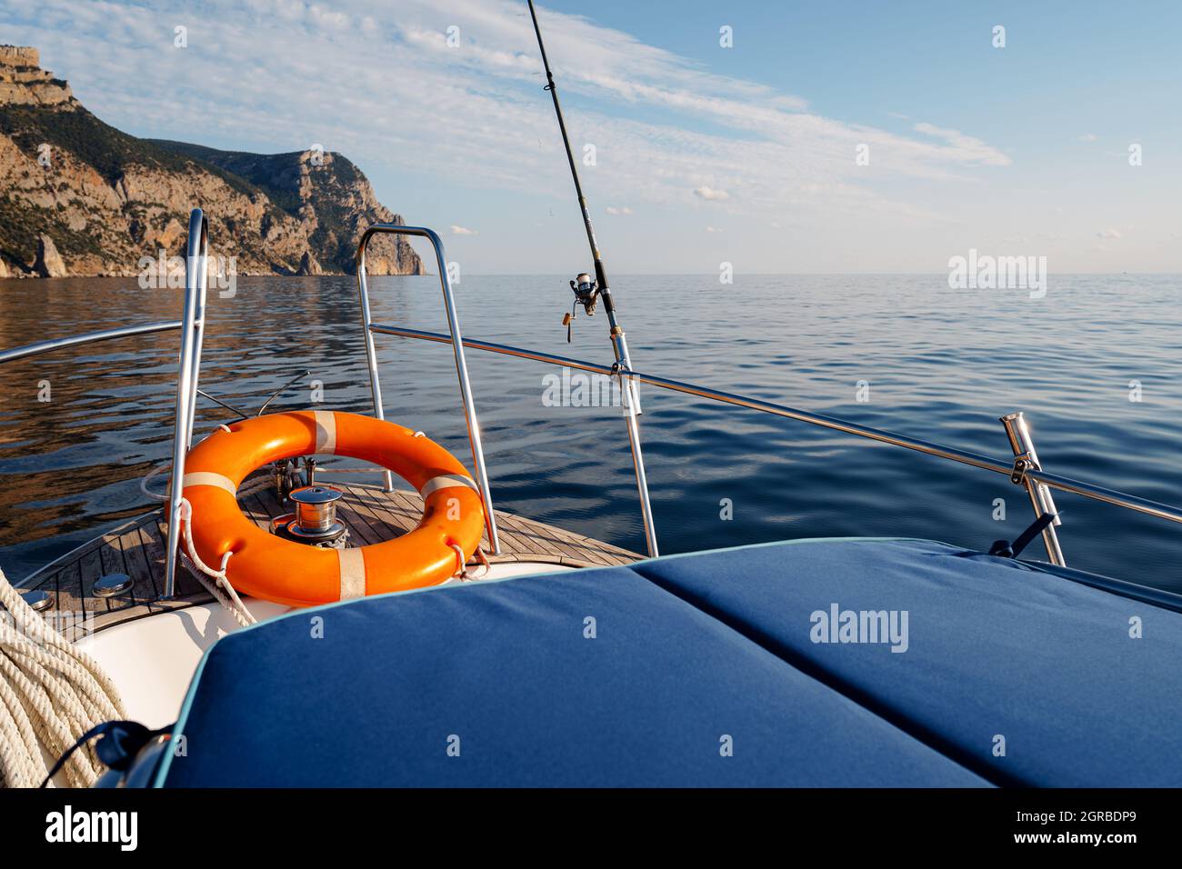Lifebuoy saver ring on sailboat in open sea Stock Photo - Alamy