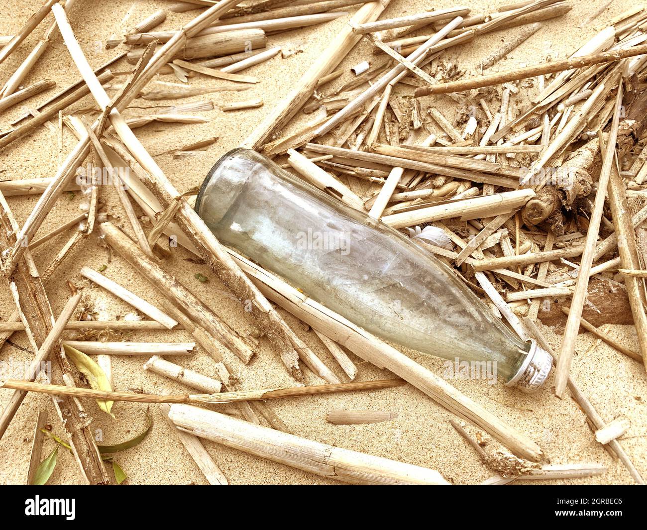 Message in a Bottle Washed Ashore. Glass bottle on the sand Stock Photo ...
