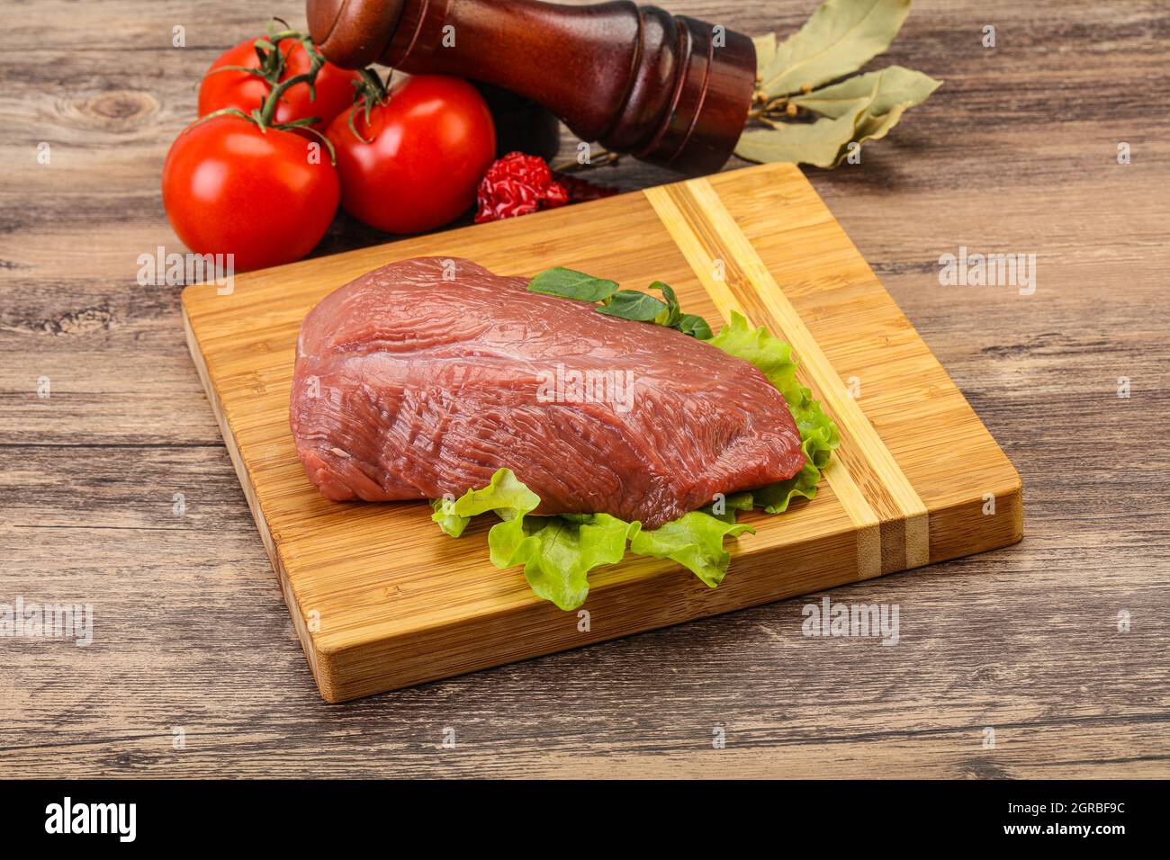 Raw beef meat piece for cooking Stock Photo - Alamy