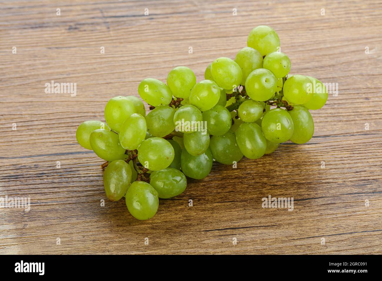 Ripe sweet green grape branch isolated Stock Photo - Alamy