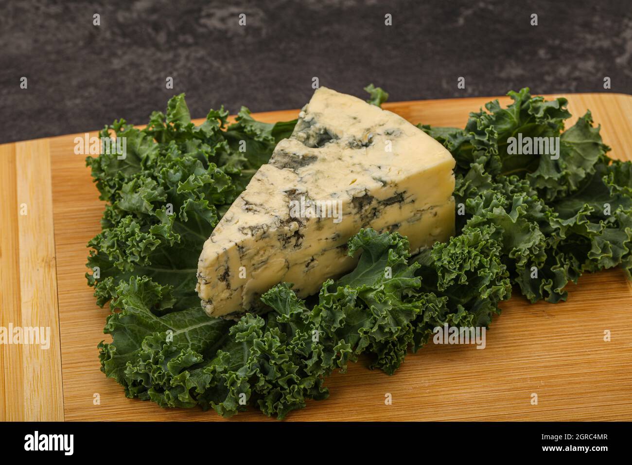 Dairy Blue cheese triangle with mold Stock Photo - Alamy