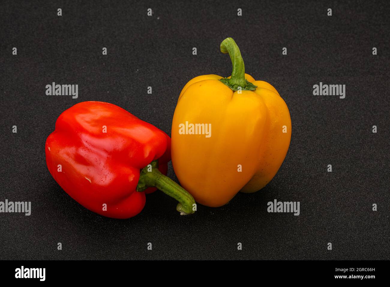 Two Ripe sweet Bulgarian bell peppers Stock Photo - Alamy