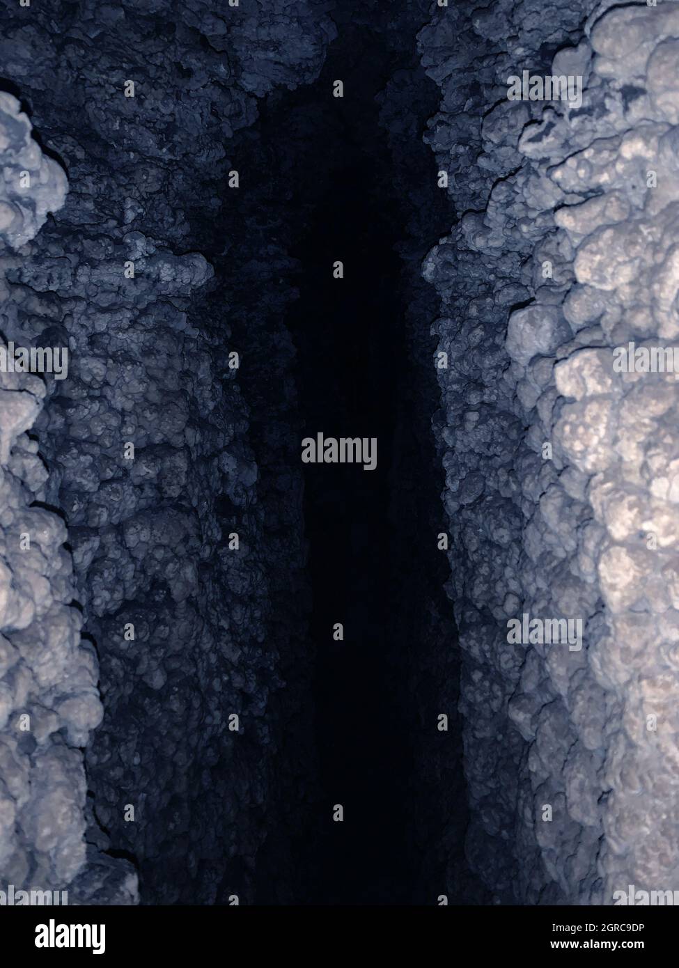 Dark and scary cave. Mistery Stock Photo - Alamy