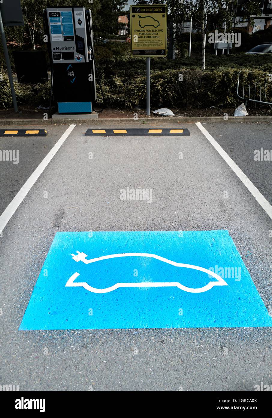 Parking space and charging point for an electric vehicle Stock Photo ...