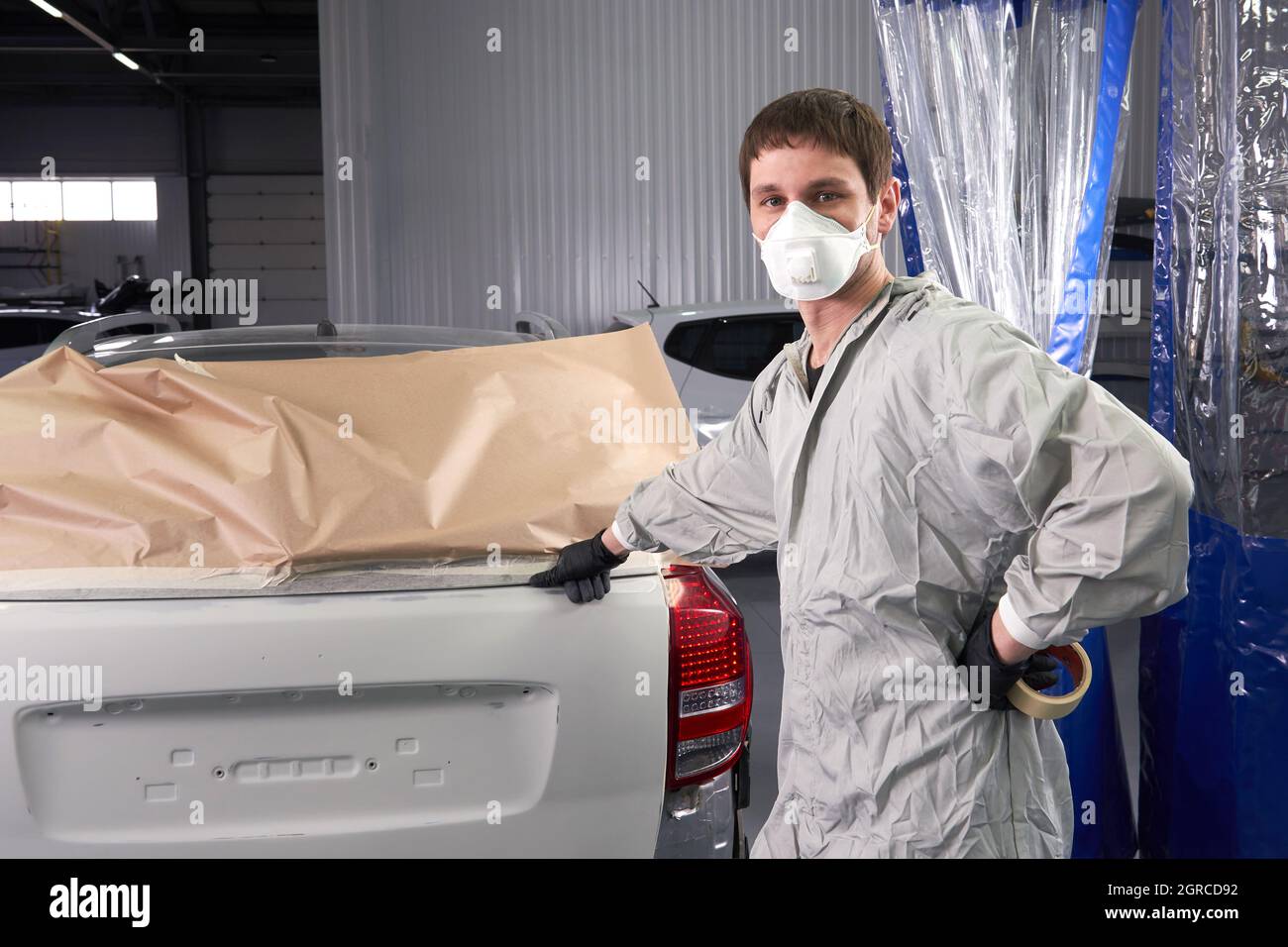 Man Working In Garage Stock Photo - Alamy