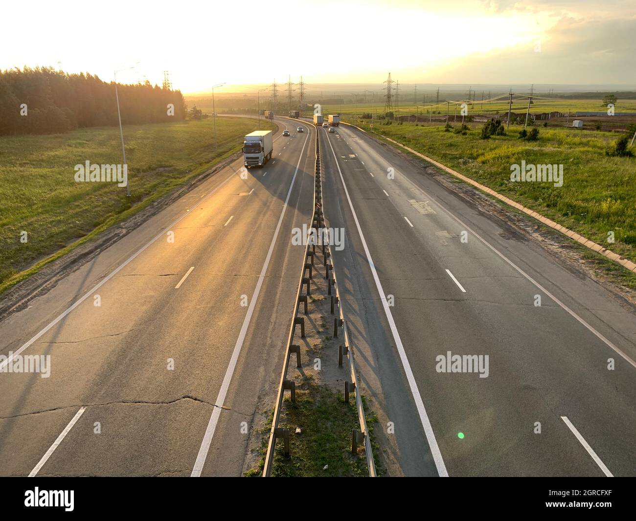 Sunset over highway. Travel concept Stock Photo - Alamy