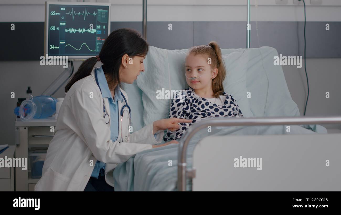 Pediatrician consultant woman doctor interacting with little child ...