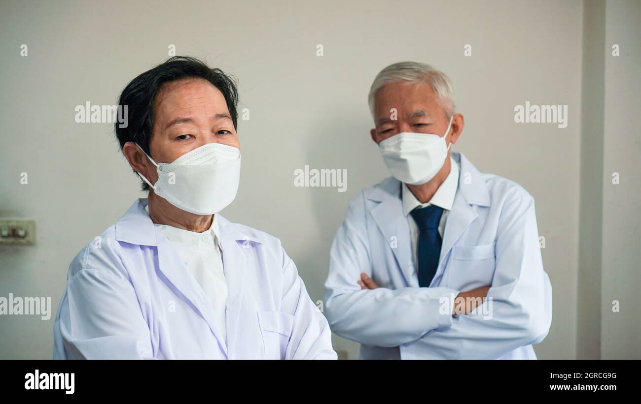 Front Line Asian Senior Medical Doctors Anxiety And Depress With ...