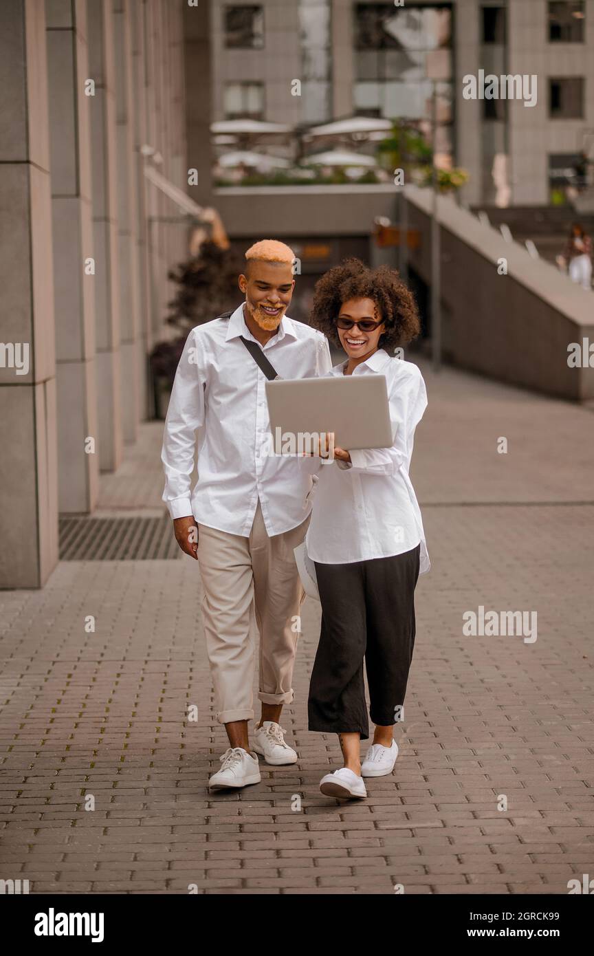 Young people looking something on hi-res stock photography and images ...