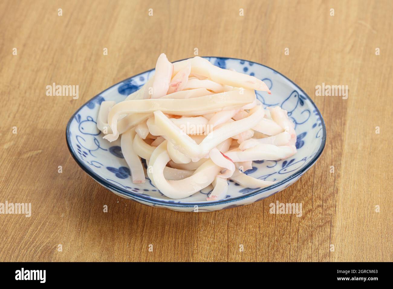 Marinated squid strips snack in the bowl Stock Photo - Alamy