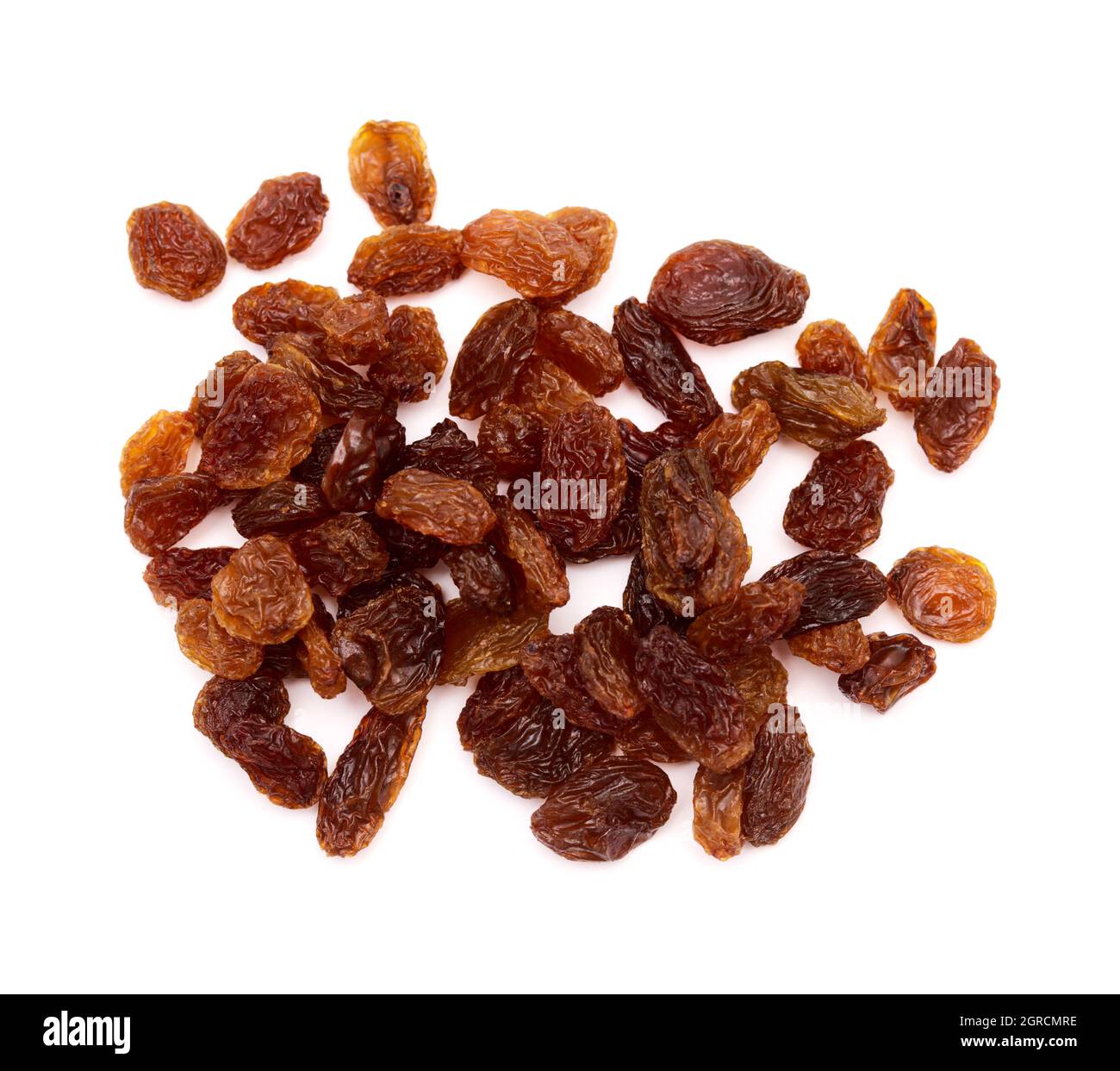 handful of sultana raisins isolated on white background Stock Photo - Alamy