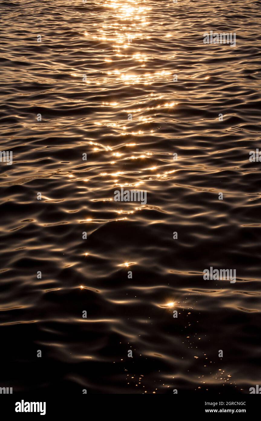 Vertical sea background on sunset Stock Photo - Alamy