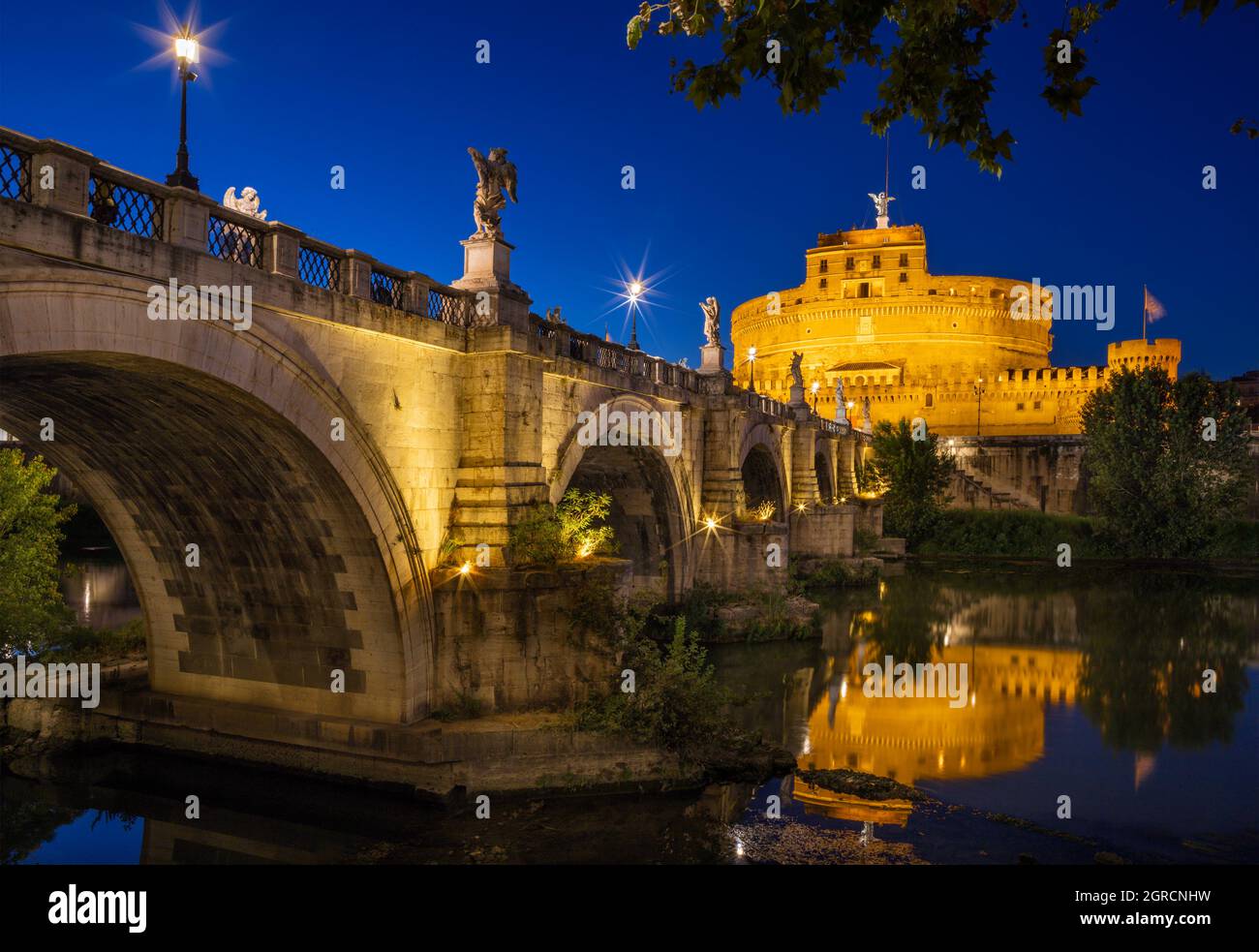 Rome - The Angels castle and bridge at dusk Stock Photo - Alamy