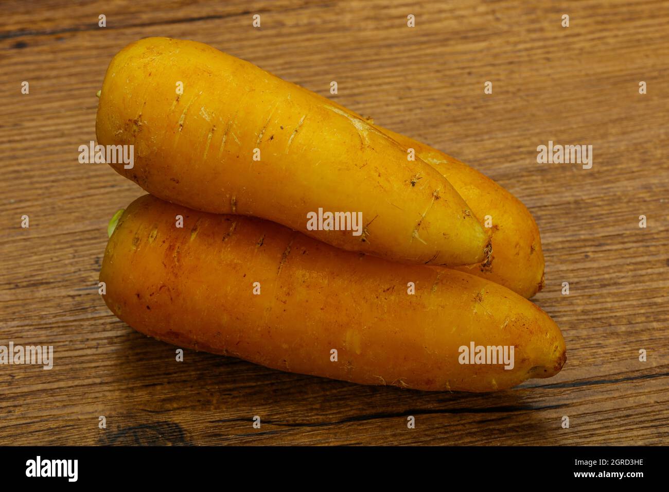 Natural vegan food - Raw Yellow carrot Stock Photo - Alamy