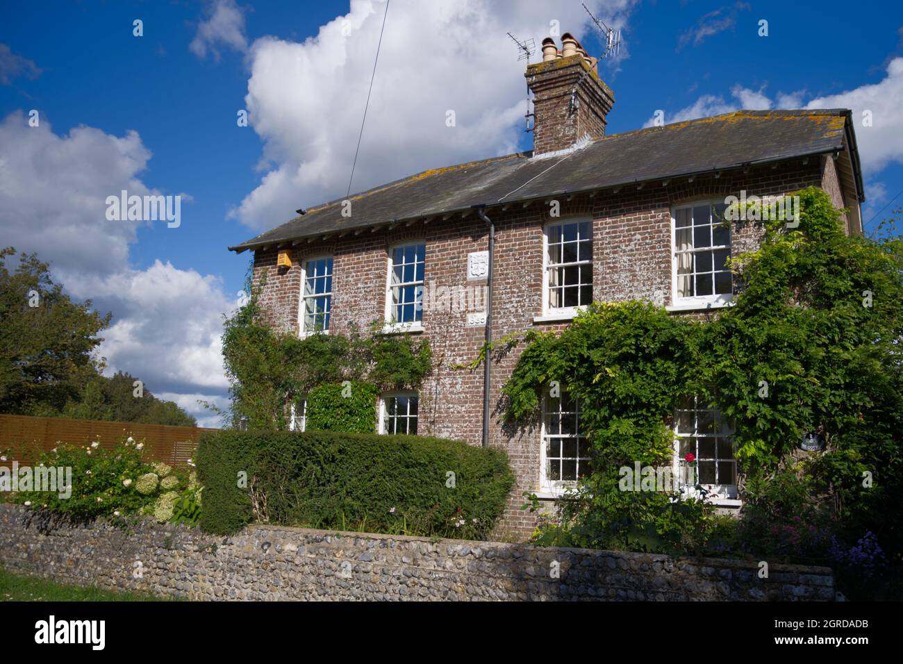 Two traditional English semi detached cottages in the village of ...