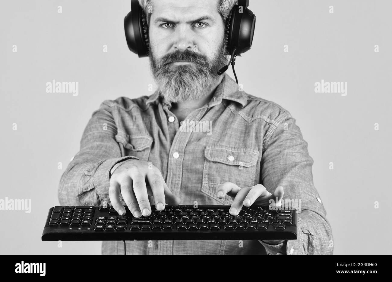 Software Engineer Working. Digital Music Creation. bearded man listen ...