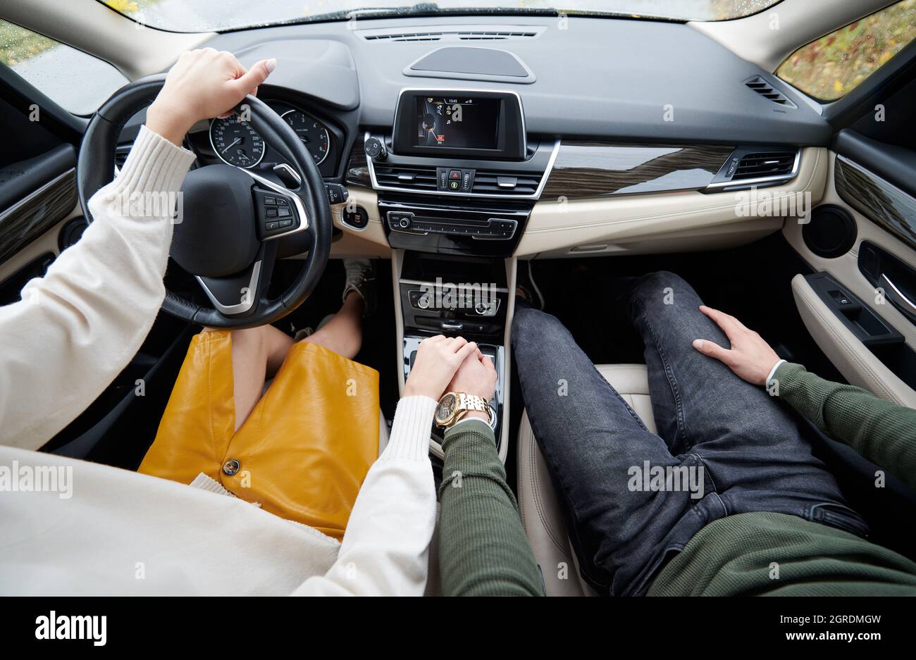Close up cropped high angle shot of loving couple holding each other's ...