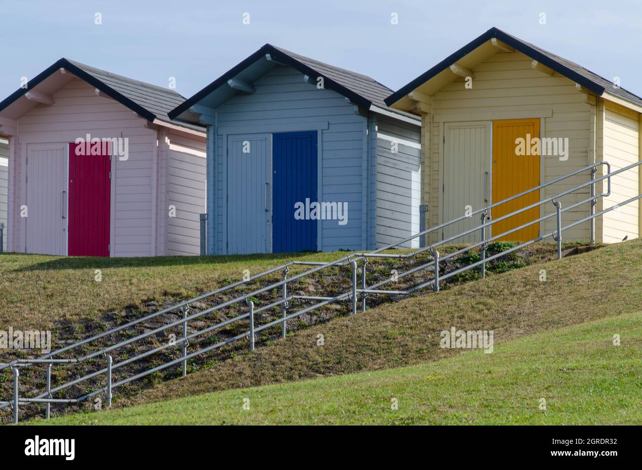 three beach huts at Mablethorpe Stock Photo - Alamy