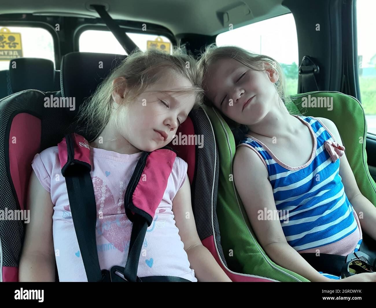 Car seats girls hi-res stock photography and images - Alamy