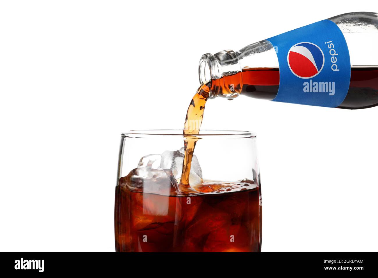 Odessa, Ukraine - September 23, 2021: Pepsi pouring from bottle to ...
