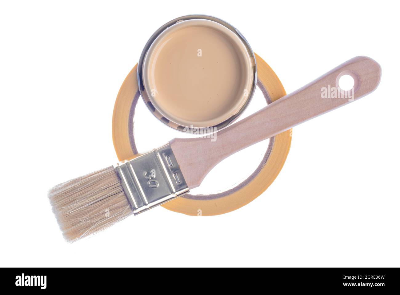 Painters tape paintbrush and lid of open paint can top view isolated on ...