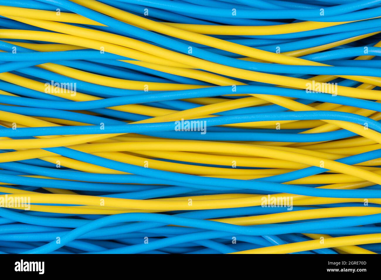 Stack of single core electrical cable directly above as background ...