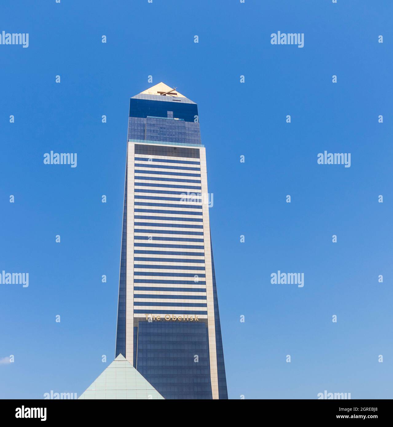 Dubai, UAE - 09.22.2021 External glass cleaning of Obelisk tower Stock ...