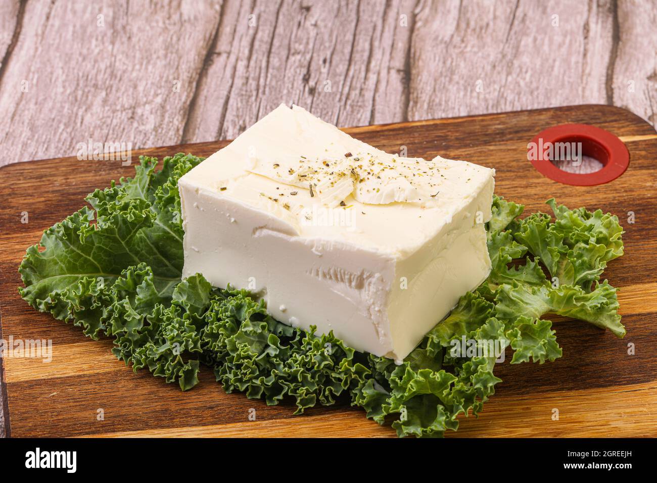 Traditional tasty Greek Feta soft cheese brick Stock Photo - Alamy