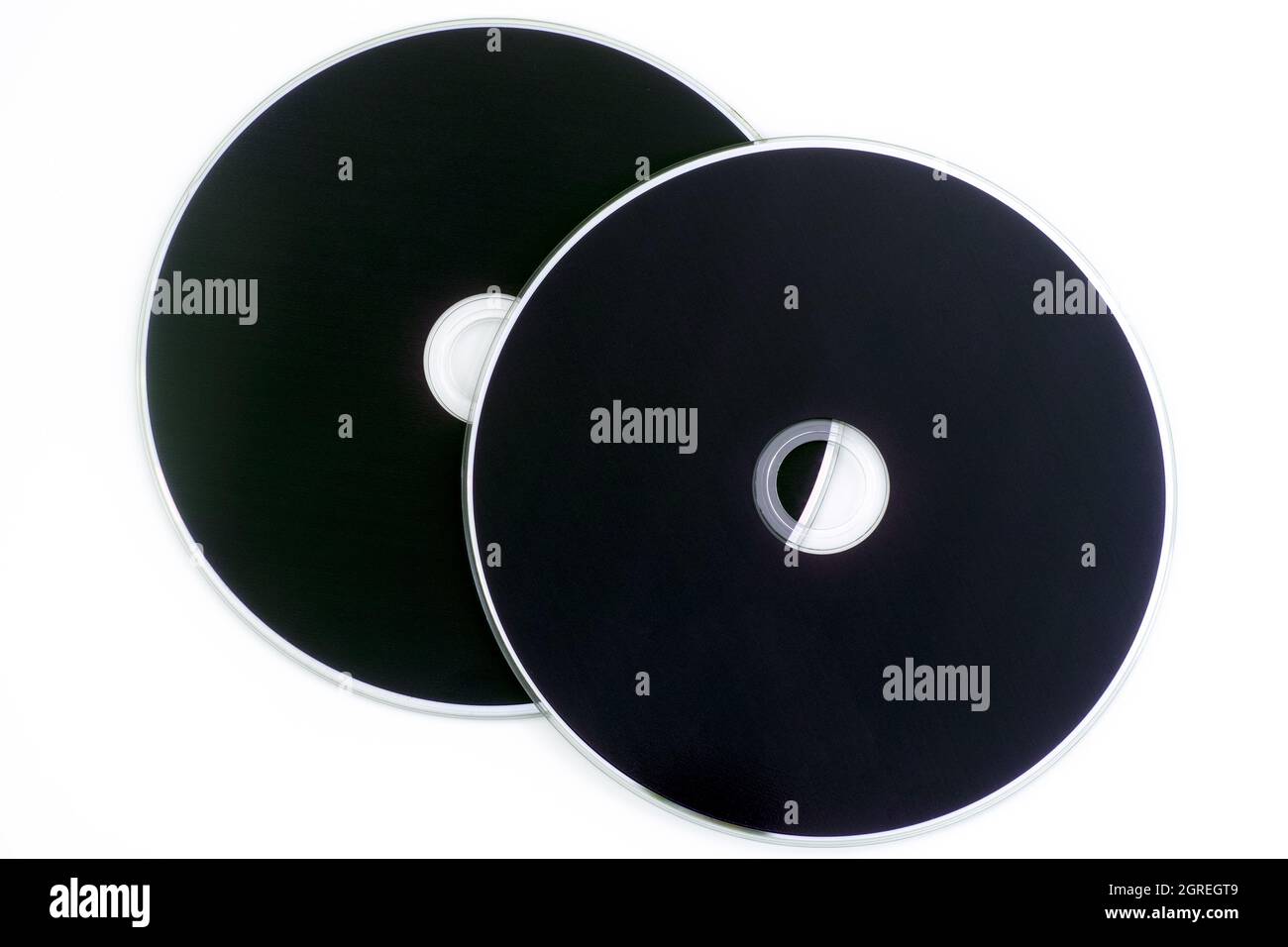 Two black DVD discs on white background Stock Photo - Alamy