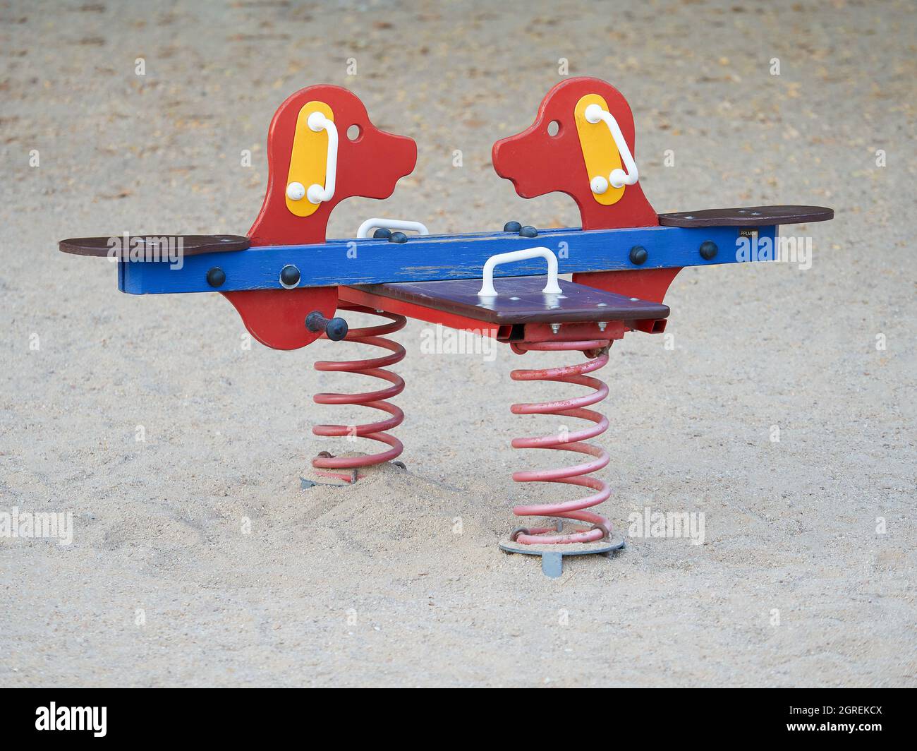 Selective closeup of rocking dogs in a playground Stock Photo - Alamy