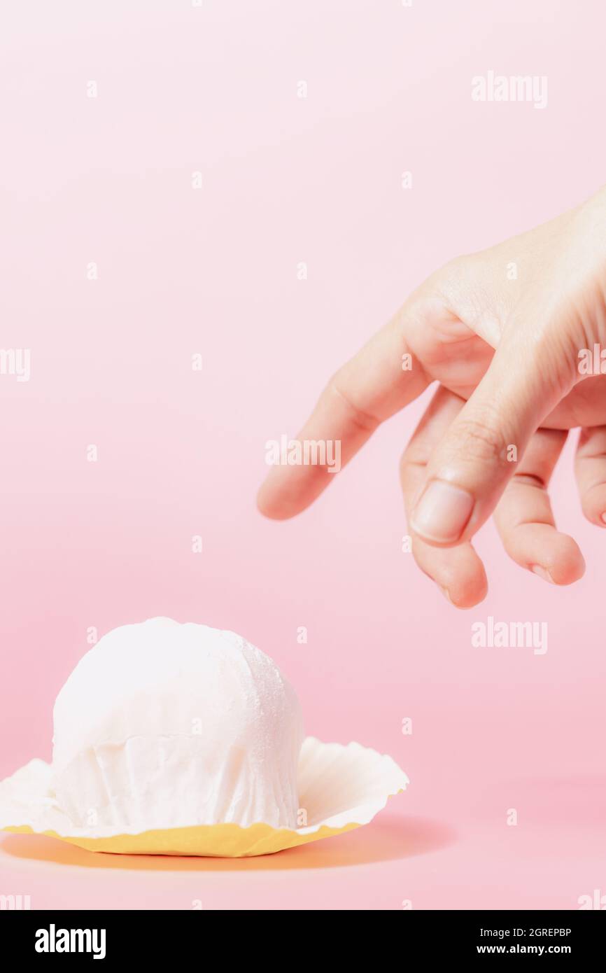 Hand reaching out for cake hi-res stock photography and images - Alamy