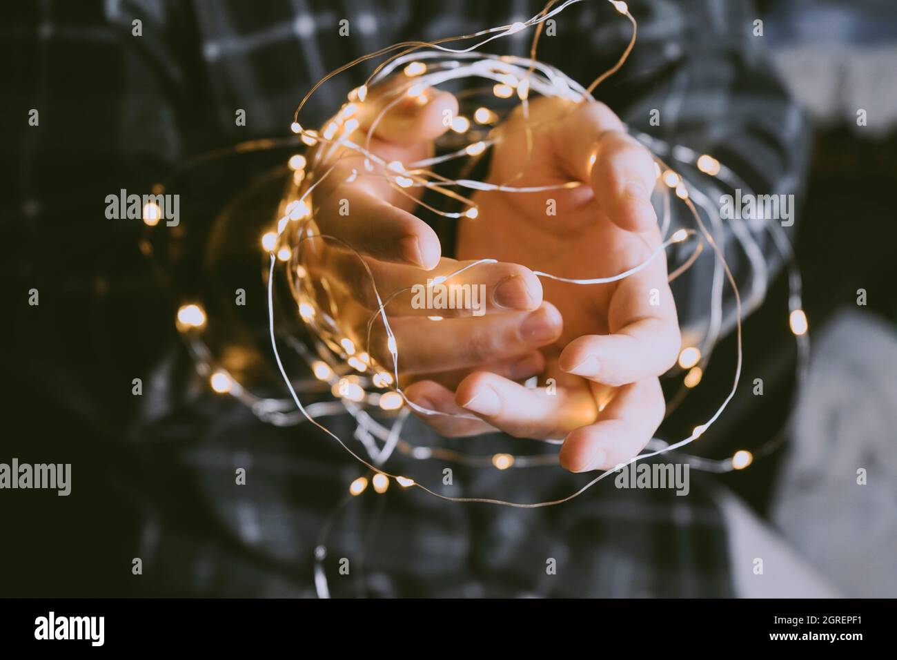 Holding glowing light ethereal hi-res stock photography and images - Alamy