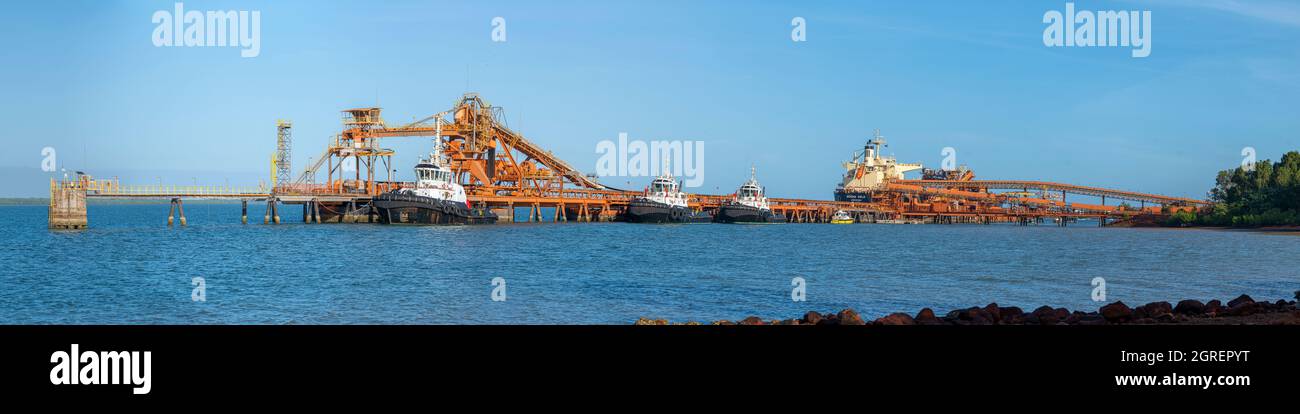 Bulk ore carrier being loaded with bauxite at Port of Weipa, Cape York ...