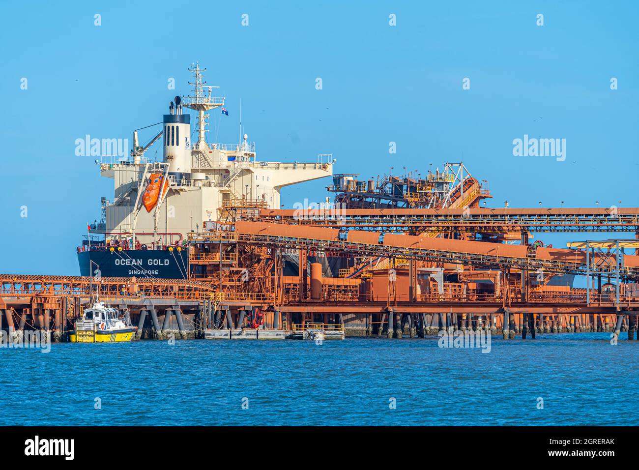 Bulk ore carrier being loaded with bauxite at Port of Weipa, Cape York ...