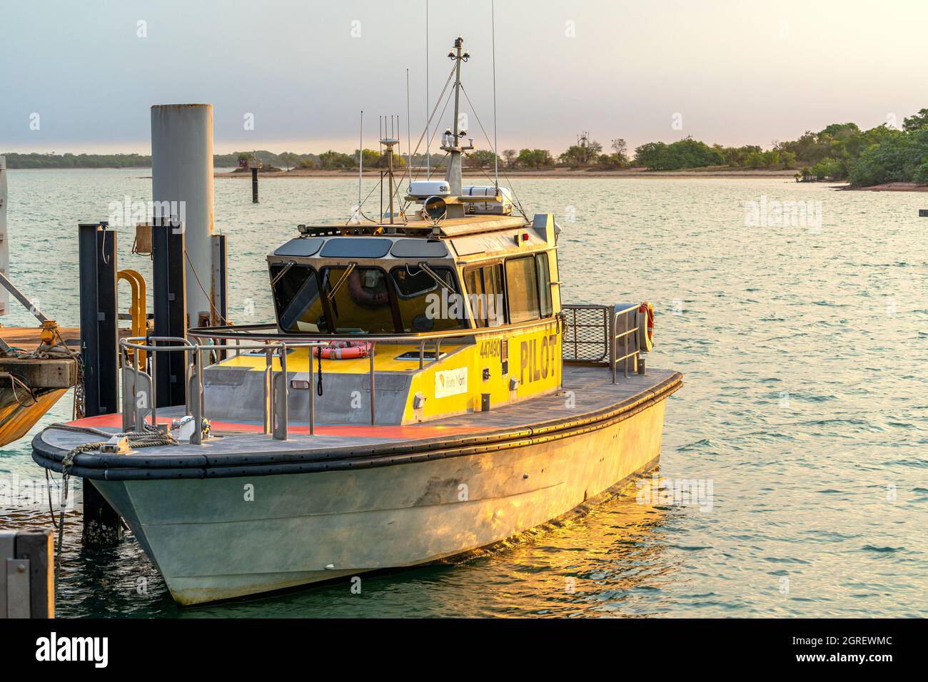 Pilot boat moored beside refueling jetty at Evan's Head, Port of Weipa ...