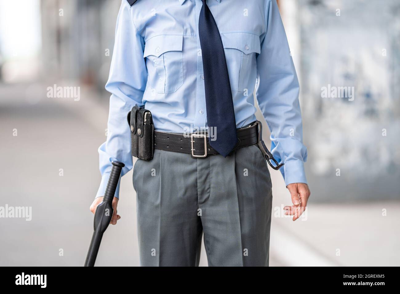 Policeman with a baton hi-res stock photography and images - Alamy