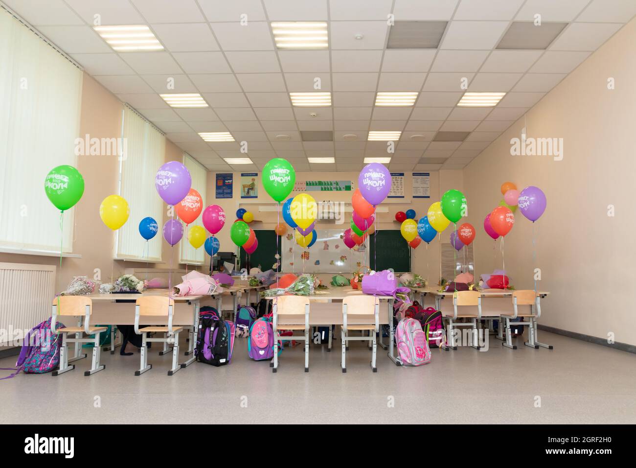 School bags on classroom table hi-res stock photography and images - Alamy
