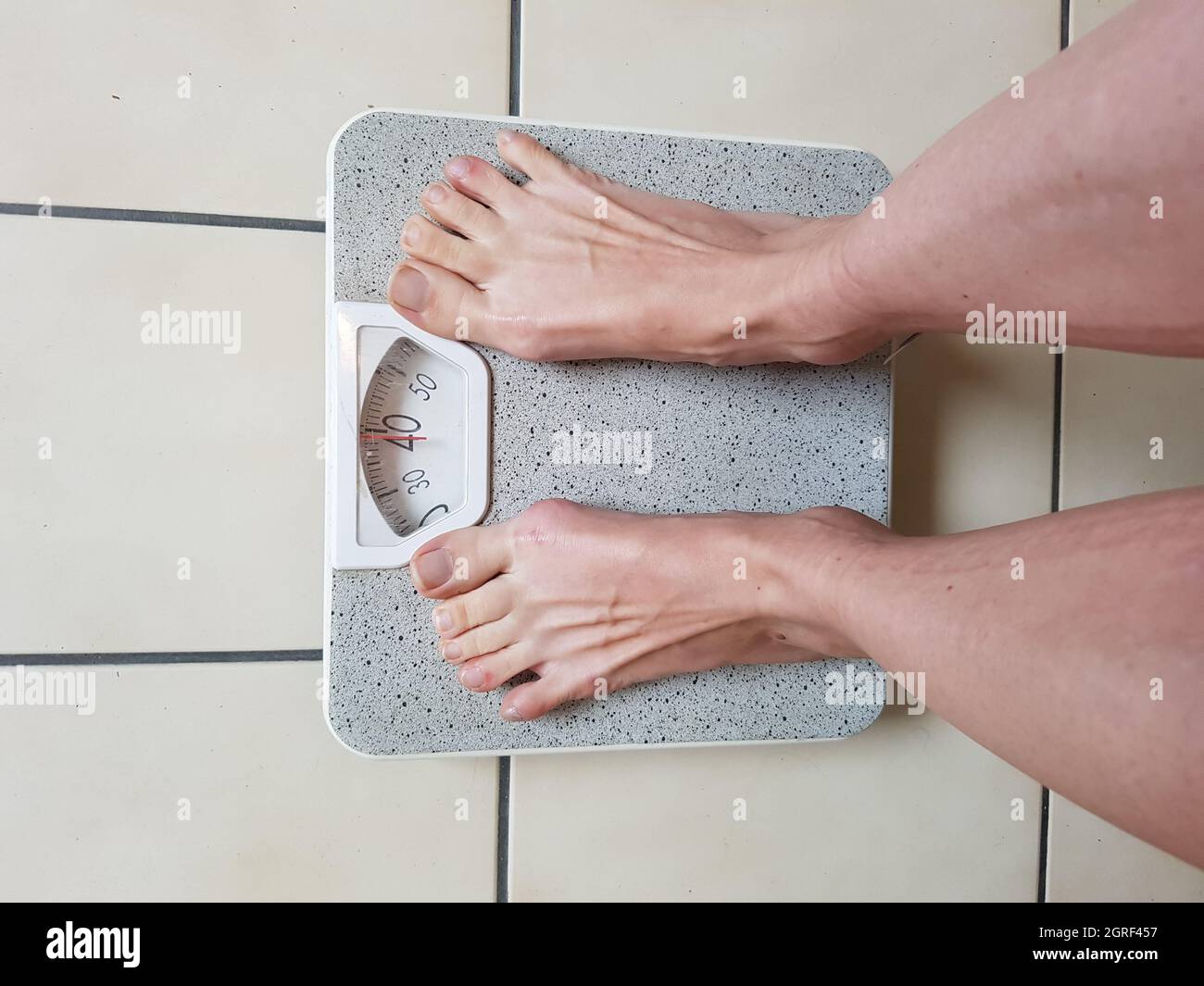 Hand weighs hi-res stock photography and images - Alamy