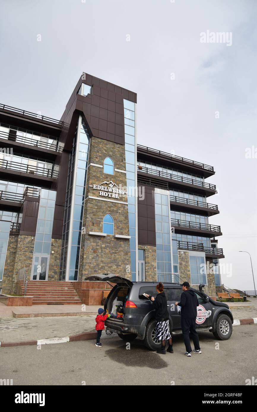 Chechnya, Russia - Sept 12, 2021: Tourist family and off-road car shown ...