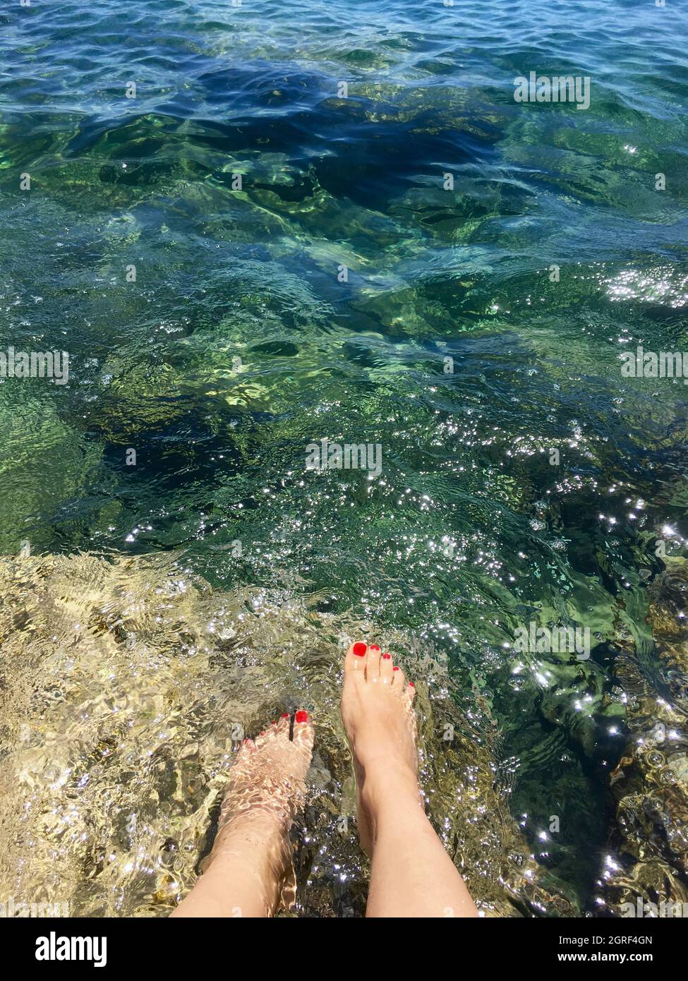 Feet in sea hi-res stock photography and images - Alamy