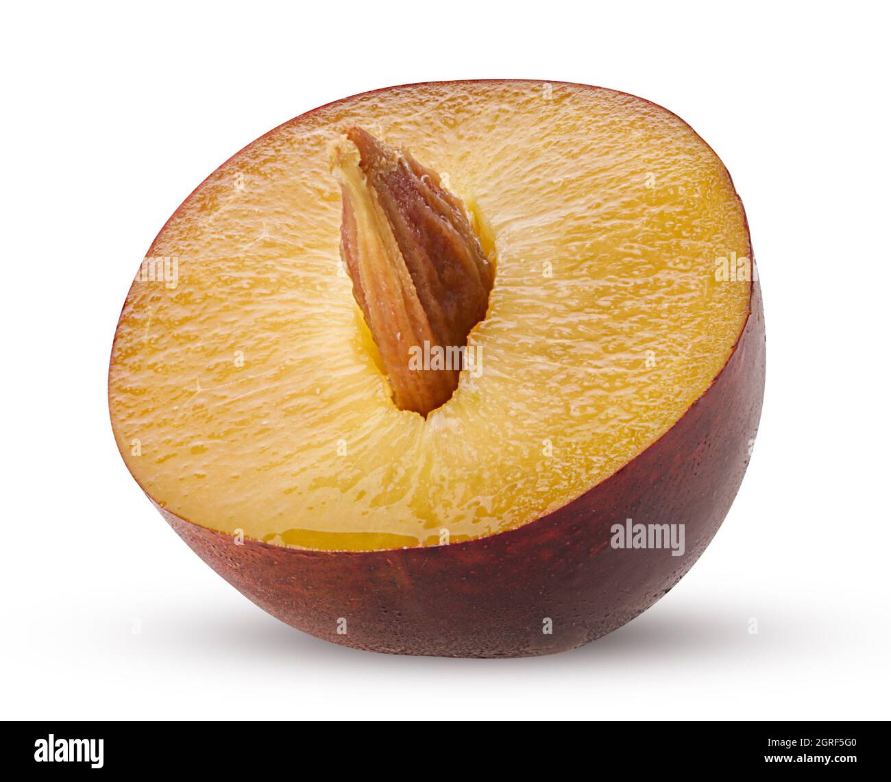 Fresh plum cut in half with bone isolated on white background Clipping ...
