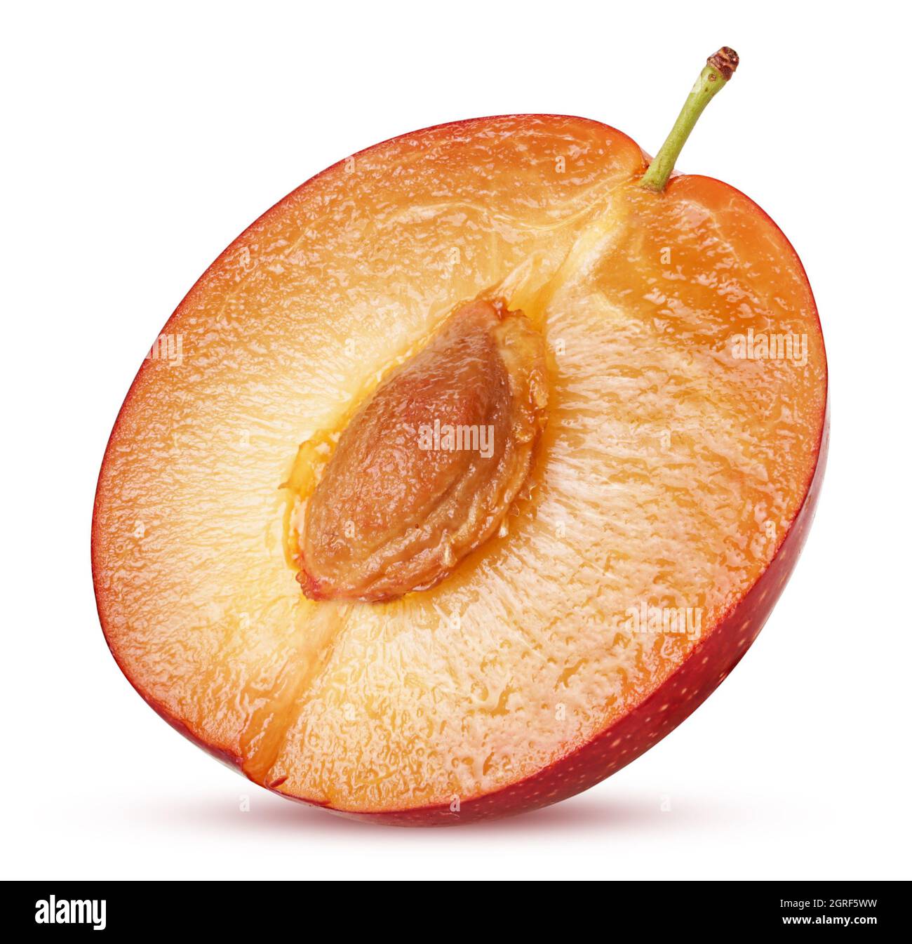 Red Plum cut in half isolated on white background Clipping Path. Full ...
