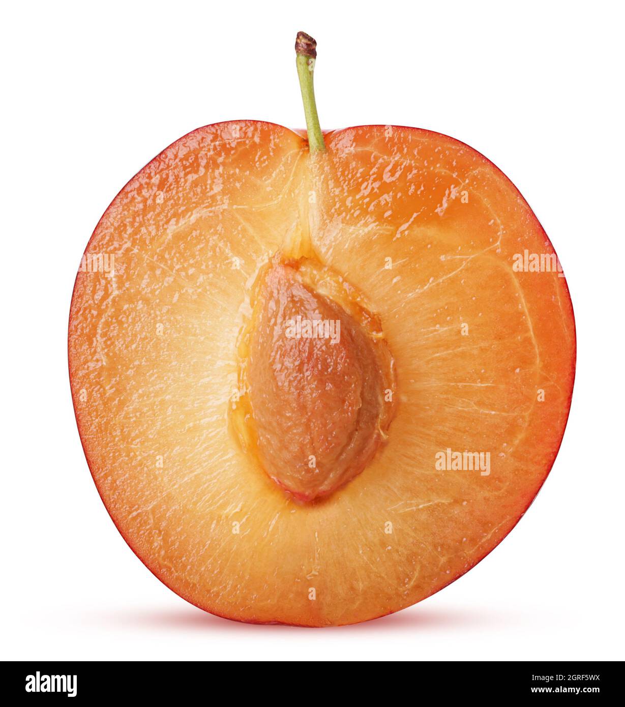 Red Plum cut in half isolated on white background Clipping Path. Full ...