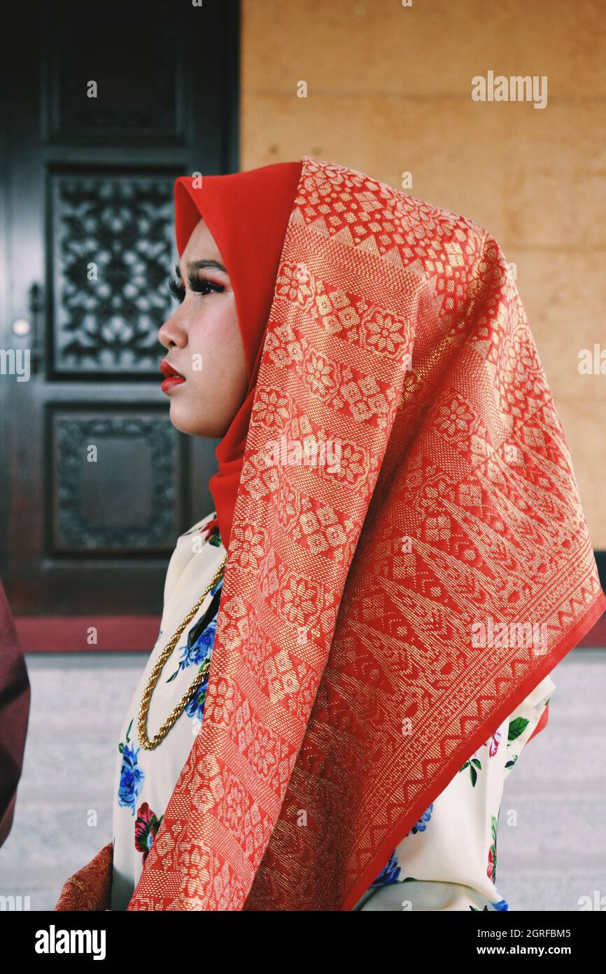 Traditional malay hat hi-res stock photography and images - Alamy