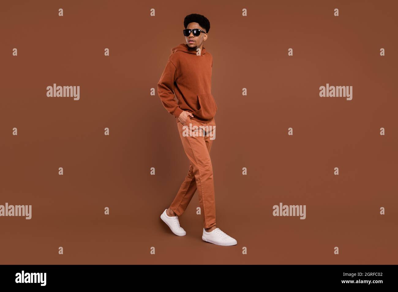 Full body profile photo of nice short hairdo young guy look empty space ...