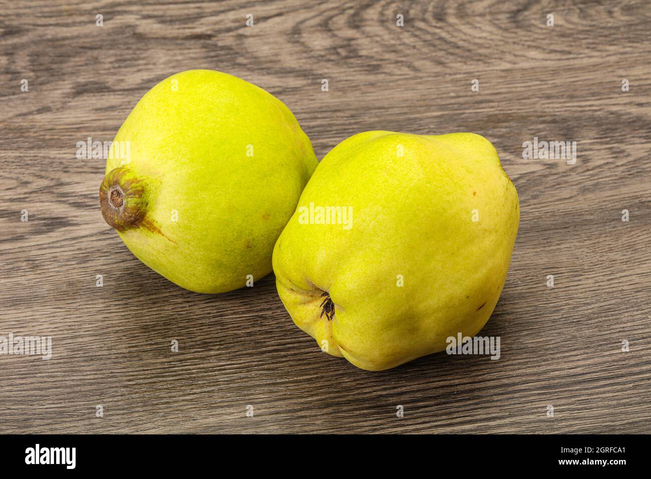 Sweet ripe and juicy quinces fruit Stock Photo - Alamy
