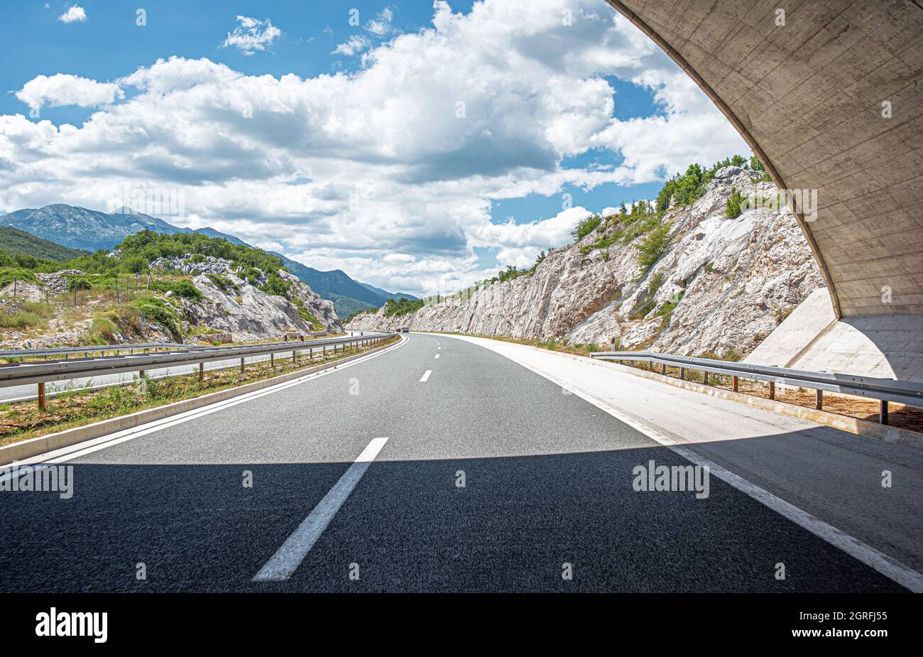Scenic road. Road is surrounded by a magnificent natural landscape ...